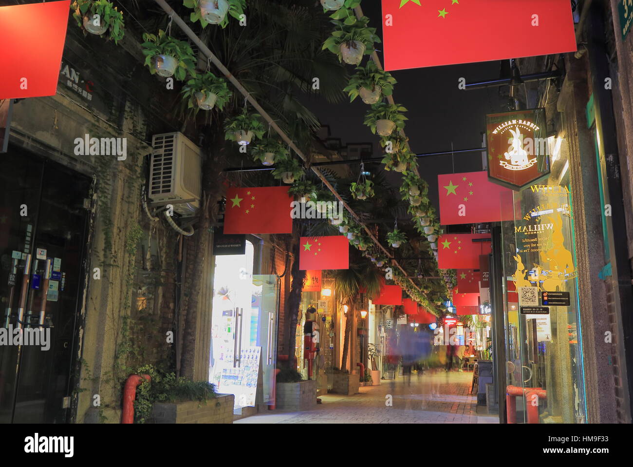 People visit Tianzifang in Shanghai China. Tianzifang is a touristic ...