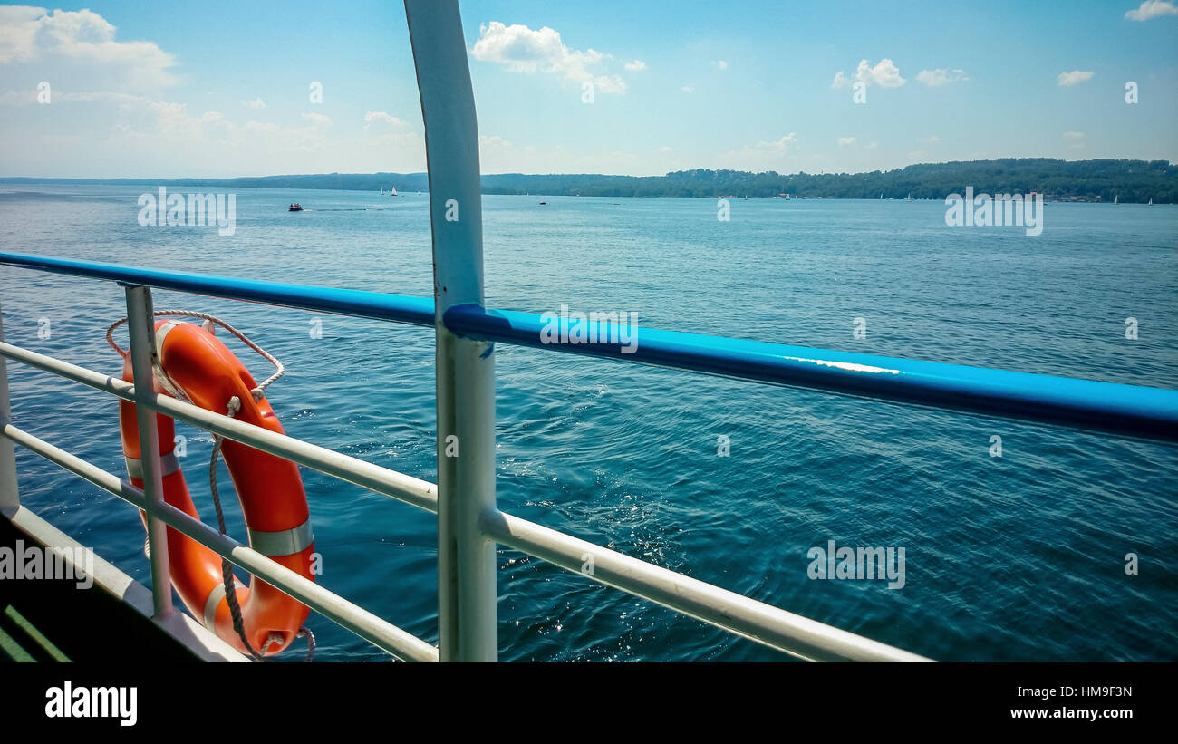 Lifebuoy on board ship at blue sky background Stock Photo - Alamy