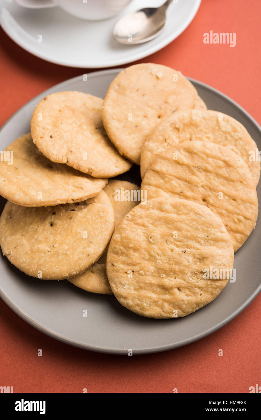 spicy fried mathri or mathari which is an indian snack served with a ...