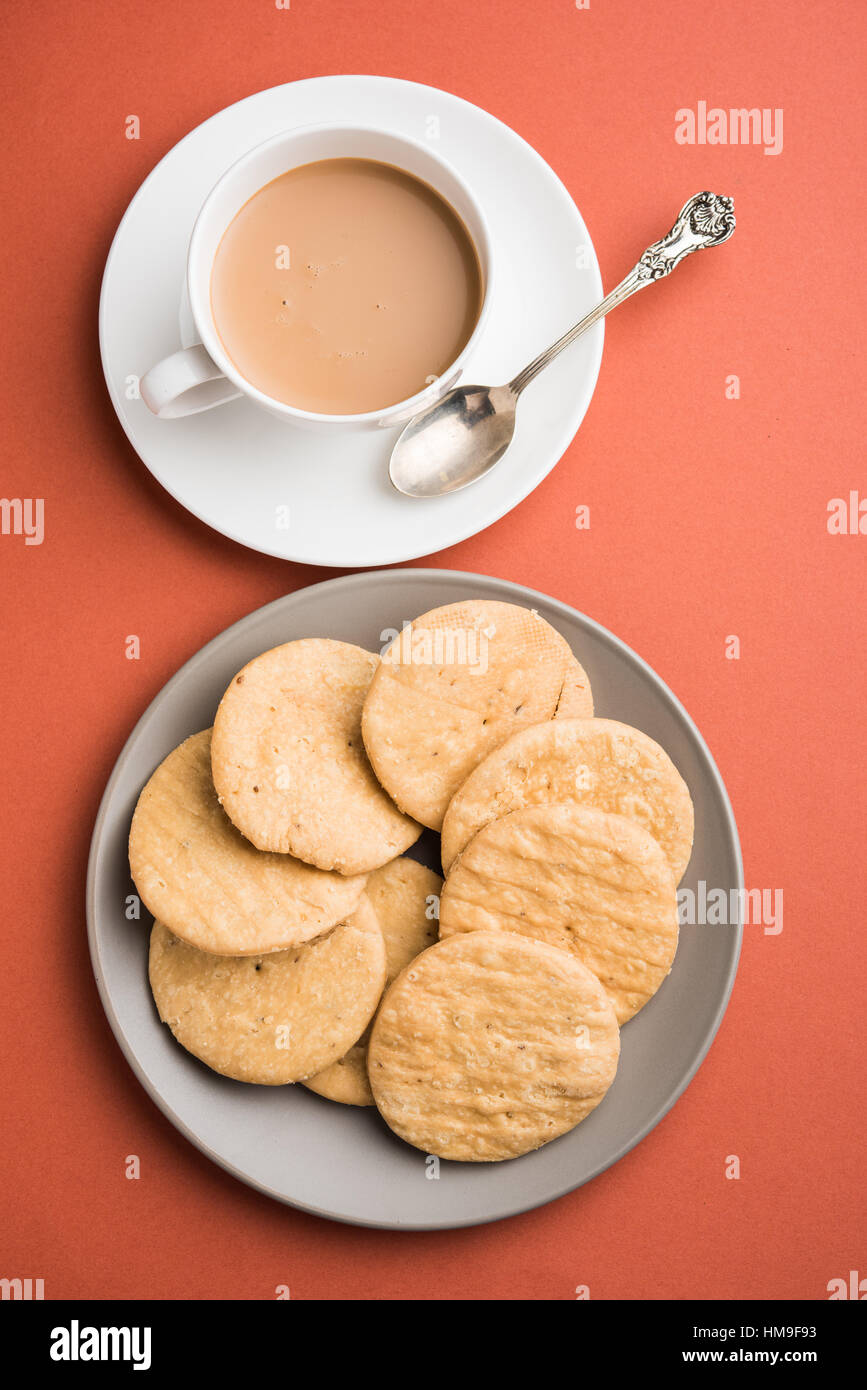 spicy fried mathri or mathari which is an indian snack served with a ...