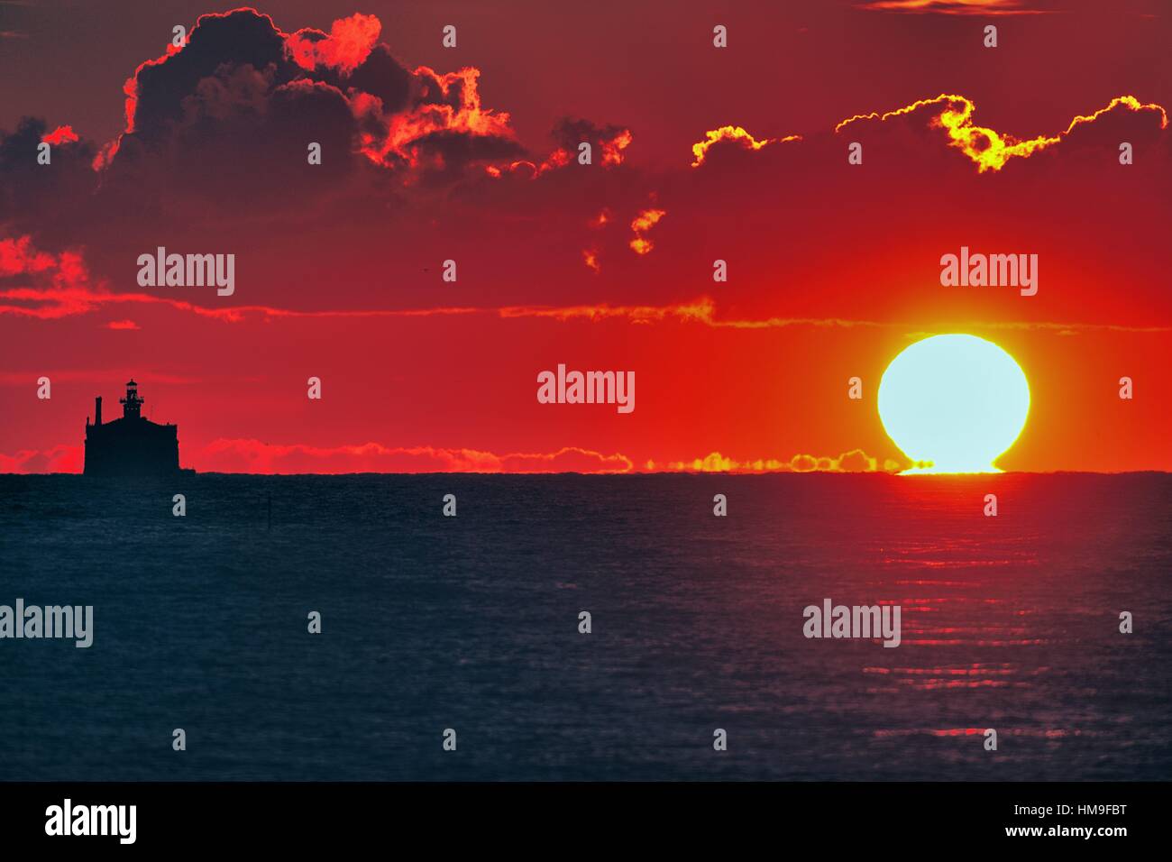 The Wilson Avenue Crib sharing a horizon with the sunrise on a summer ...