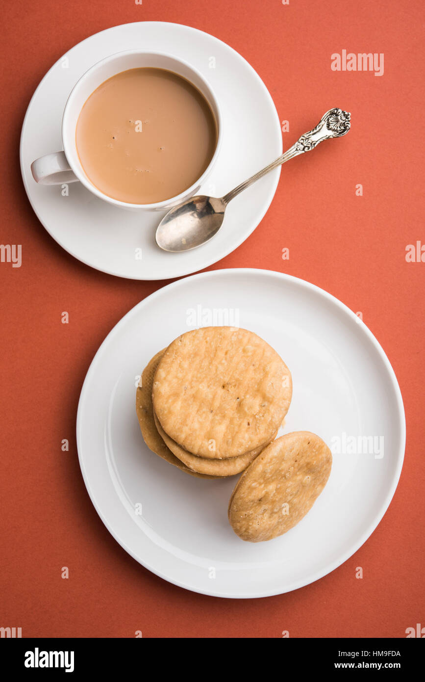 spicy fried mathri or mathari which is an indian snack served with a ...