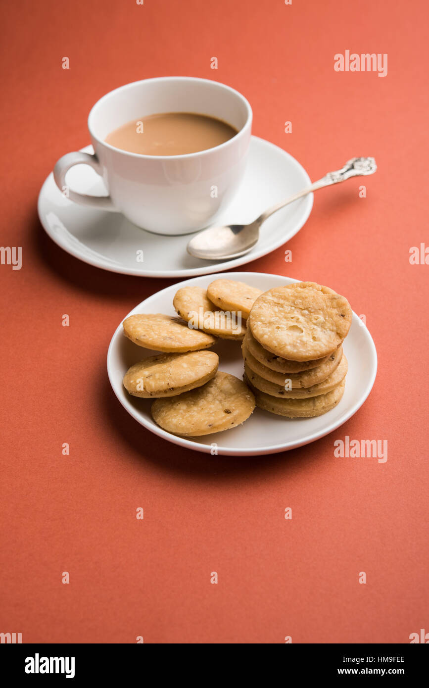 spicy fried mathri or mathari which is an indian snack served with a ...