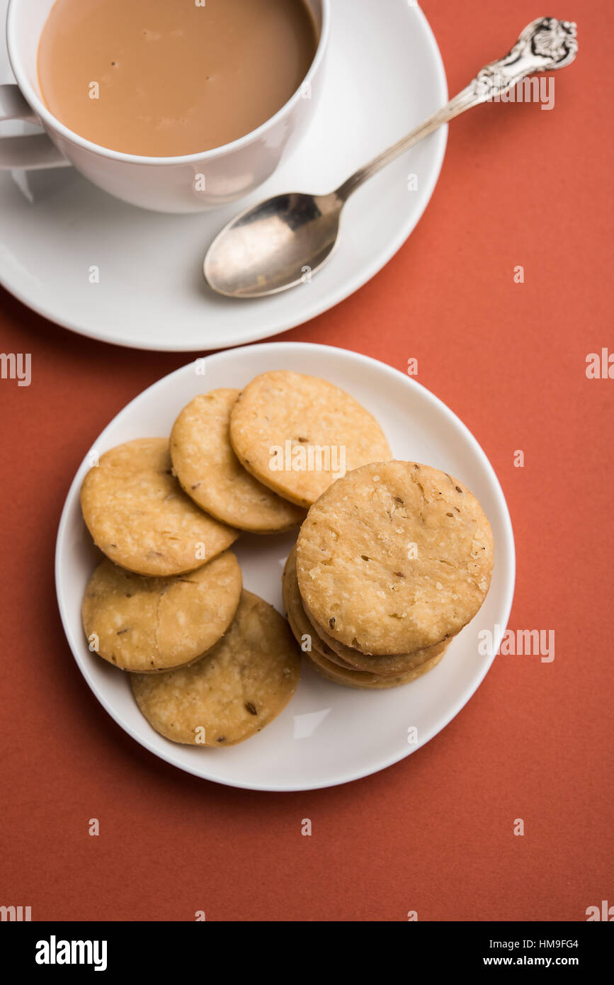 spicy fried mathri or mathari which is an indian snack served with a ...