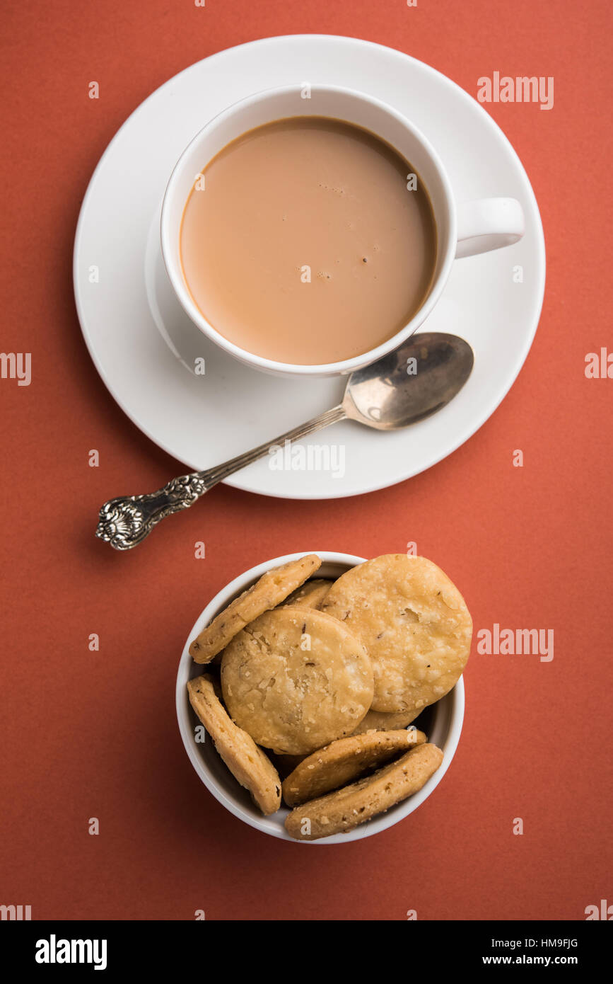 spicy fried mathri or mathari which is an indian snack served with a ...