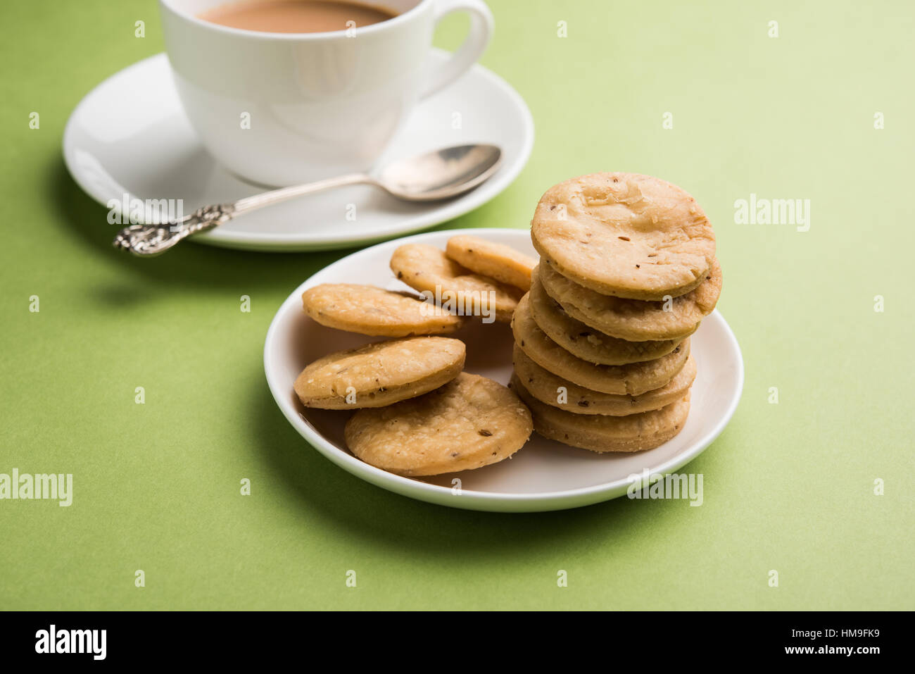 spicy fried mathri or mathari which is an indian snack served with a ...