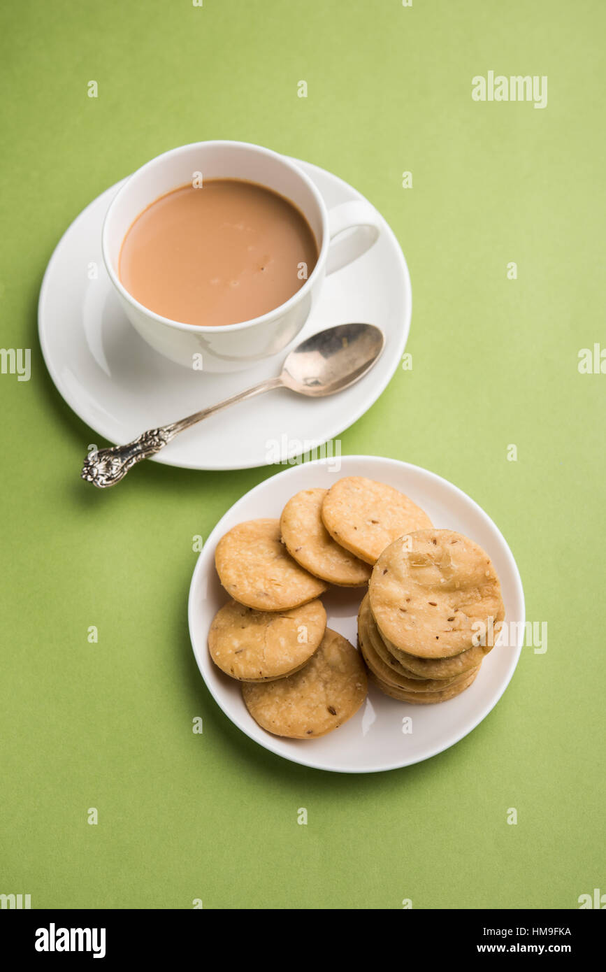 spicy fried mathri or mathari which is an indian snack served with a ...