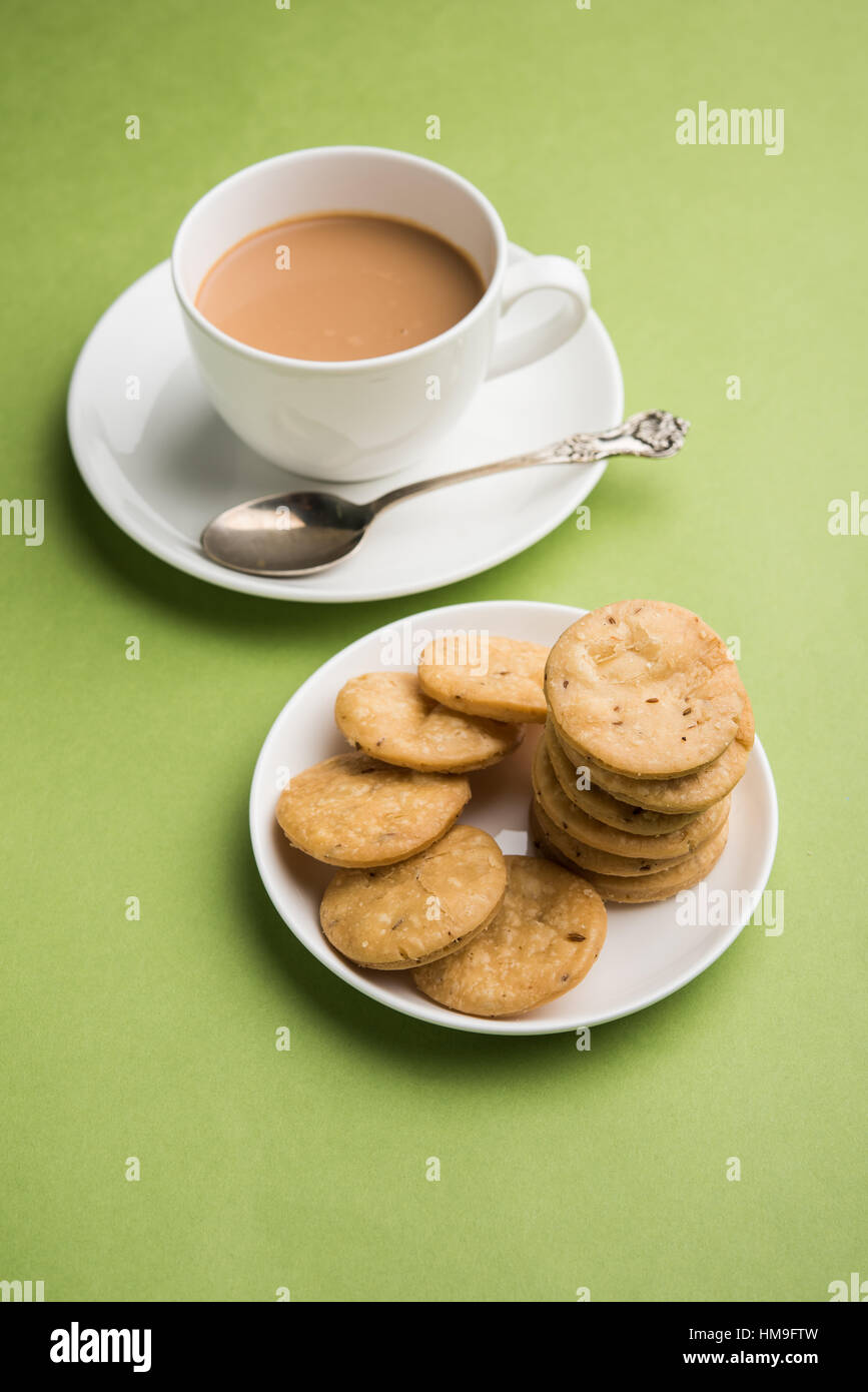 spicy fried mathri or mathari which is an indian snack served with a ...
