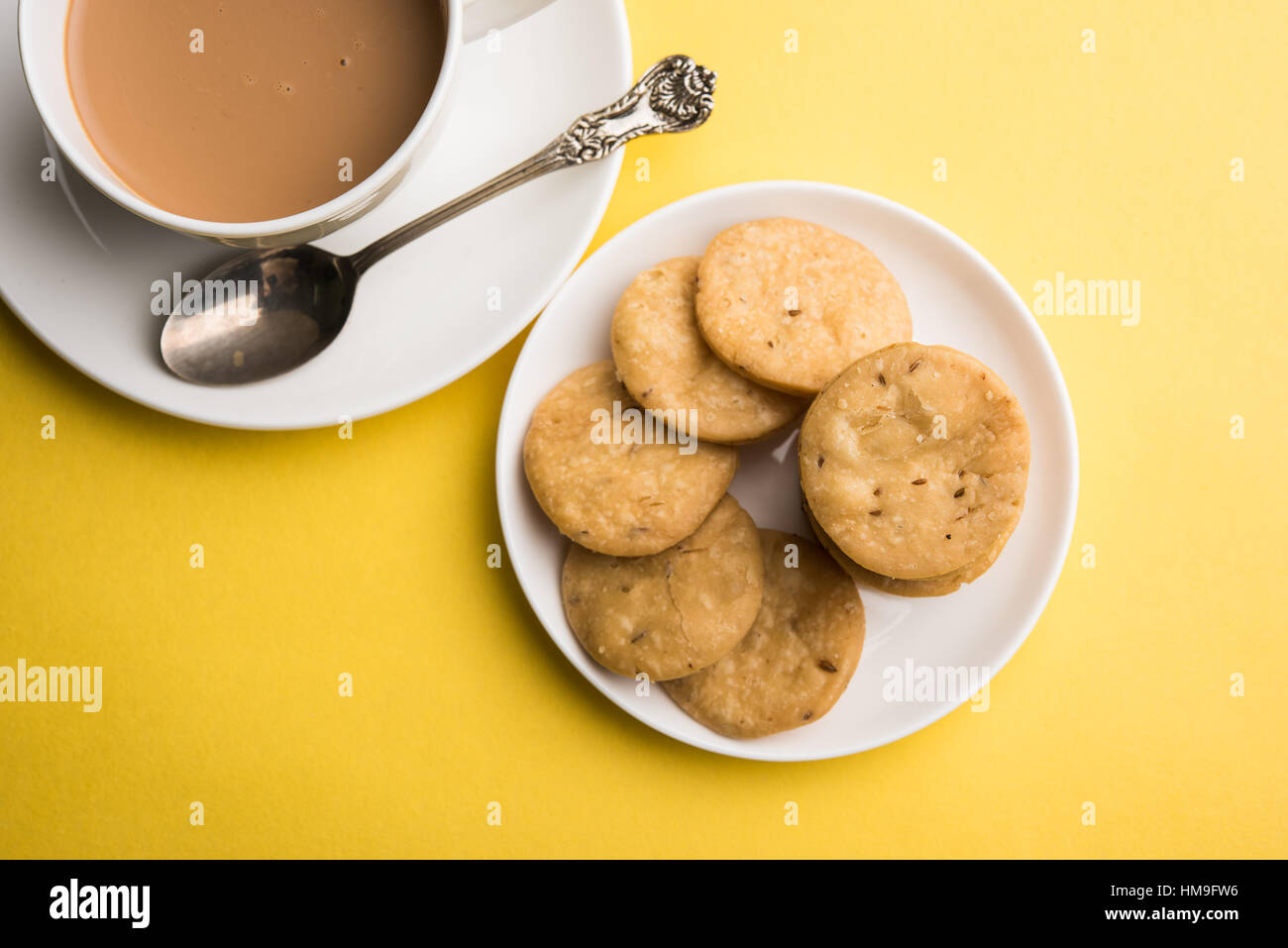 spicy fried mathri or mathari which is an indian snack served with a ...