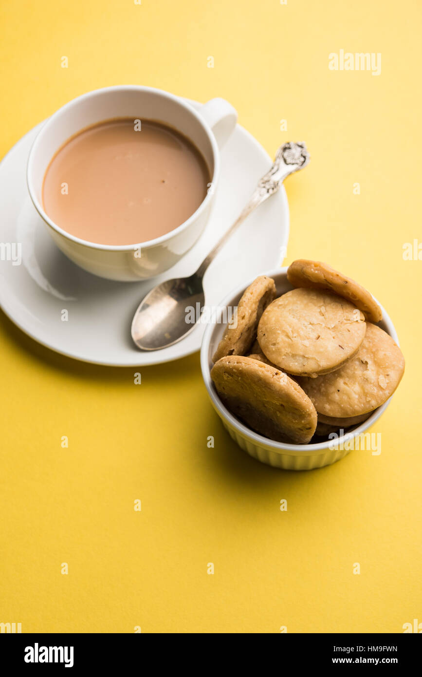 spicy fried mathri or mathari which is an indian snack served with a ...