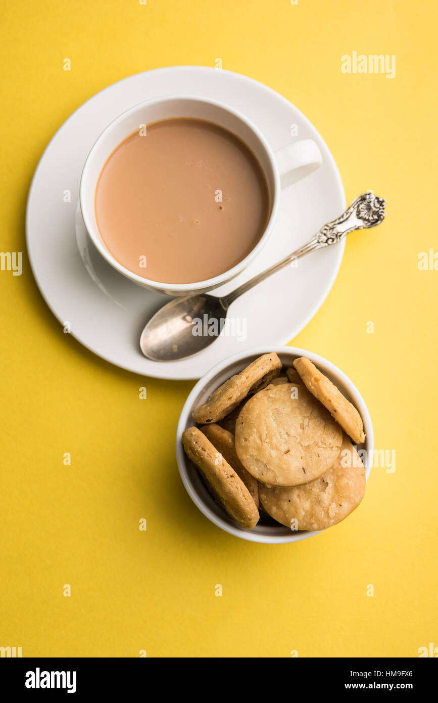 spicy fried mathri or mathari which is an indian snack served with a ...