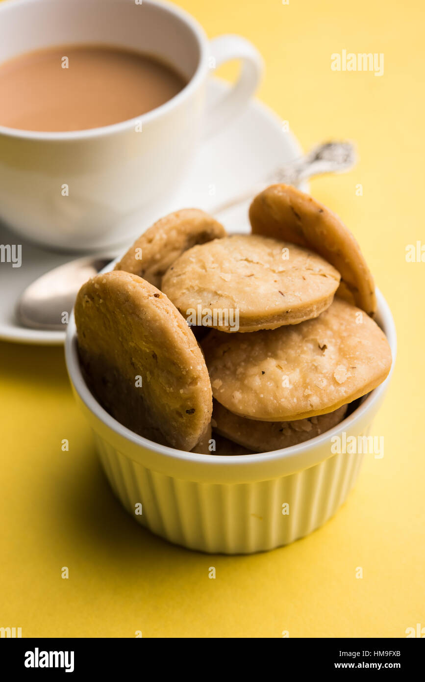 spicy fried mathri or mathari which is an indian snack served with a ...