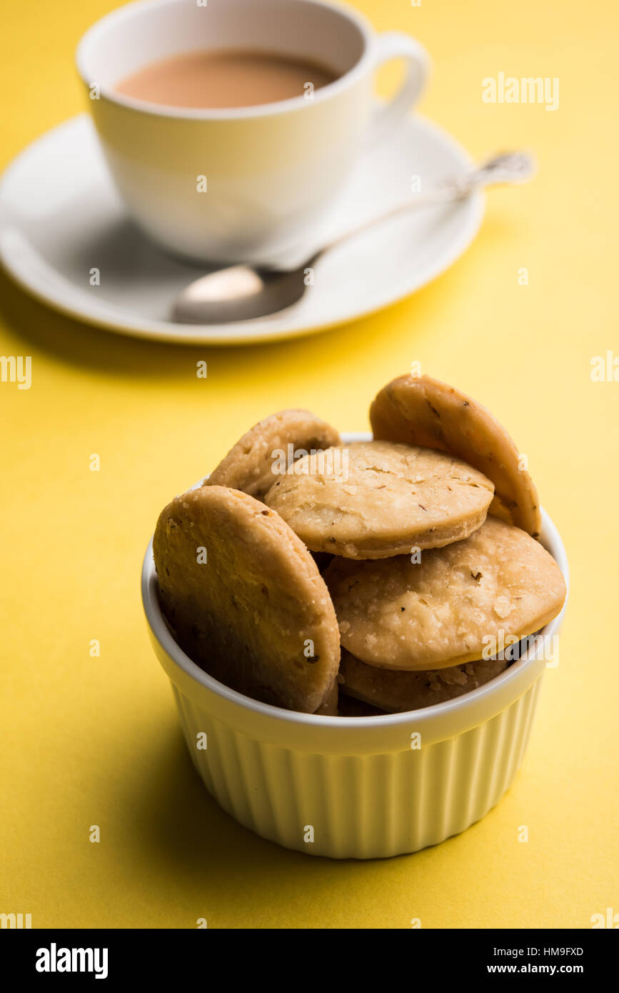 spicy fried mathri or mathari which is an indian snack served with a ...