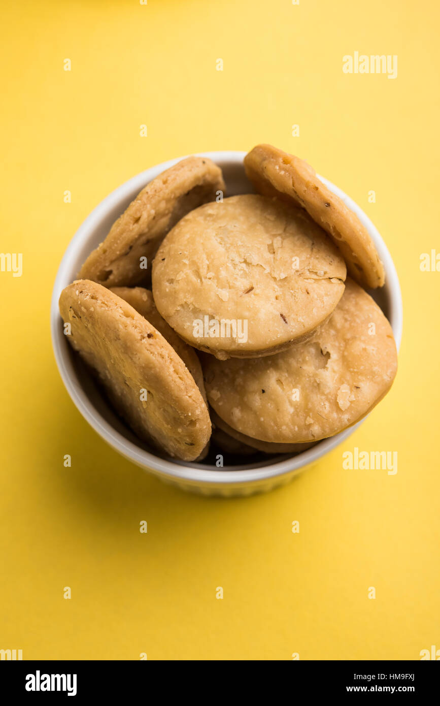 spicy fried mathri or mathari which is an indian snack served with a ...