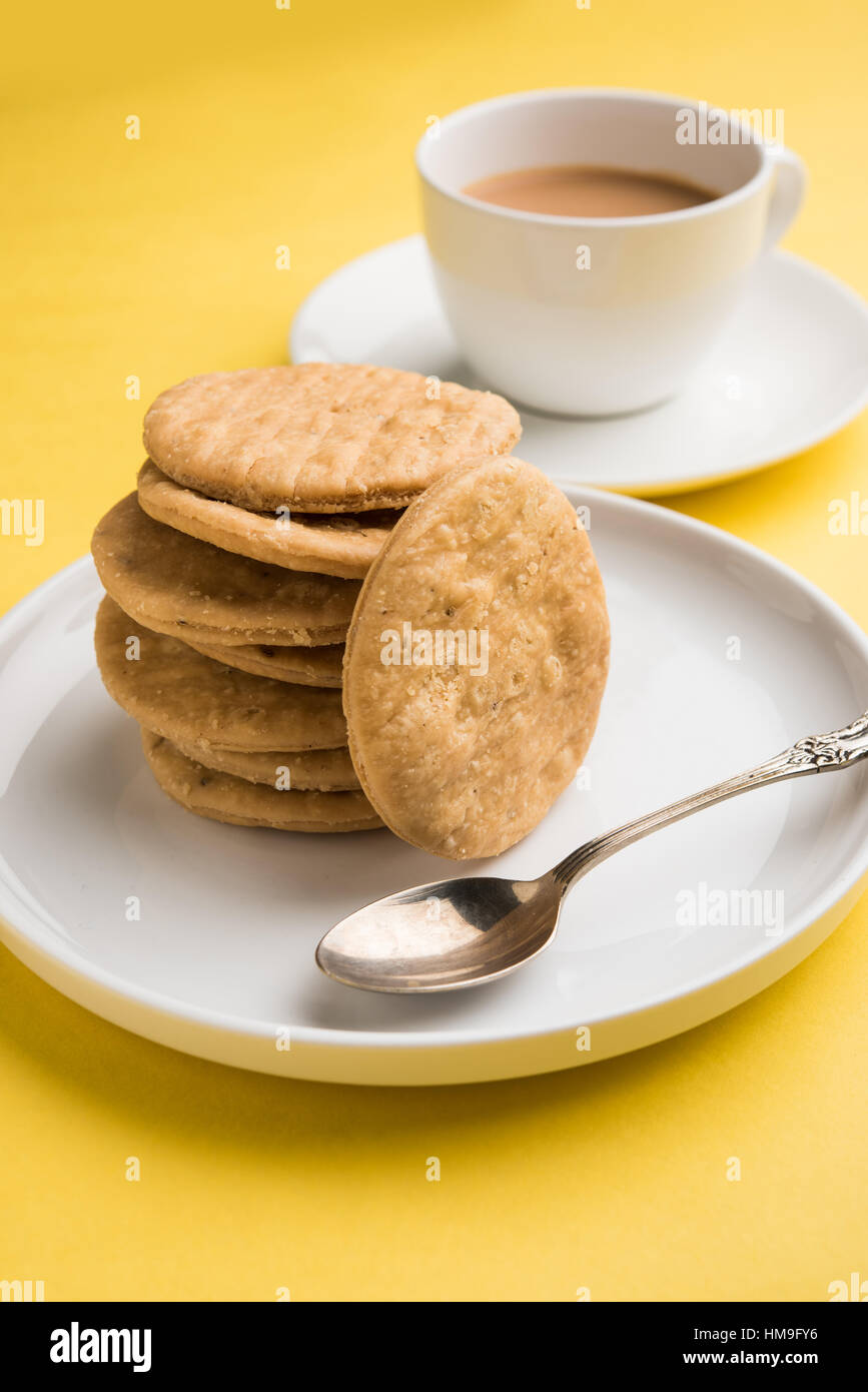 spicy fried mathri or mathari which is an indian snack served with a ...