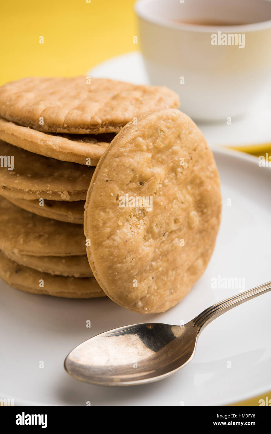 spicy fried mathri or mathari which is an indian snack served with a ...