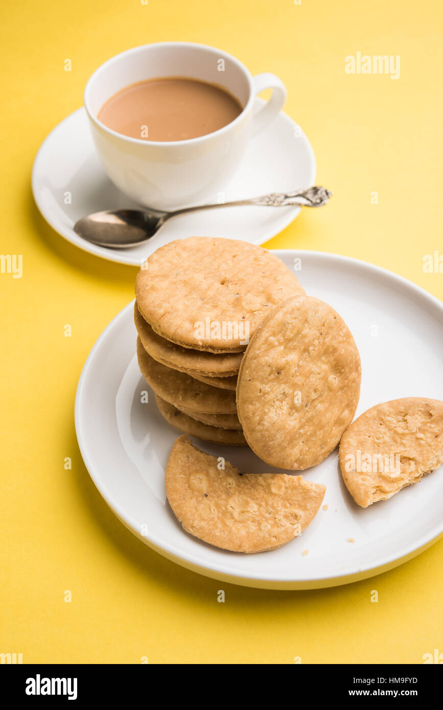 spicy fried mathri or mathari which is an indian snack served with a ...