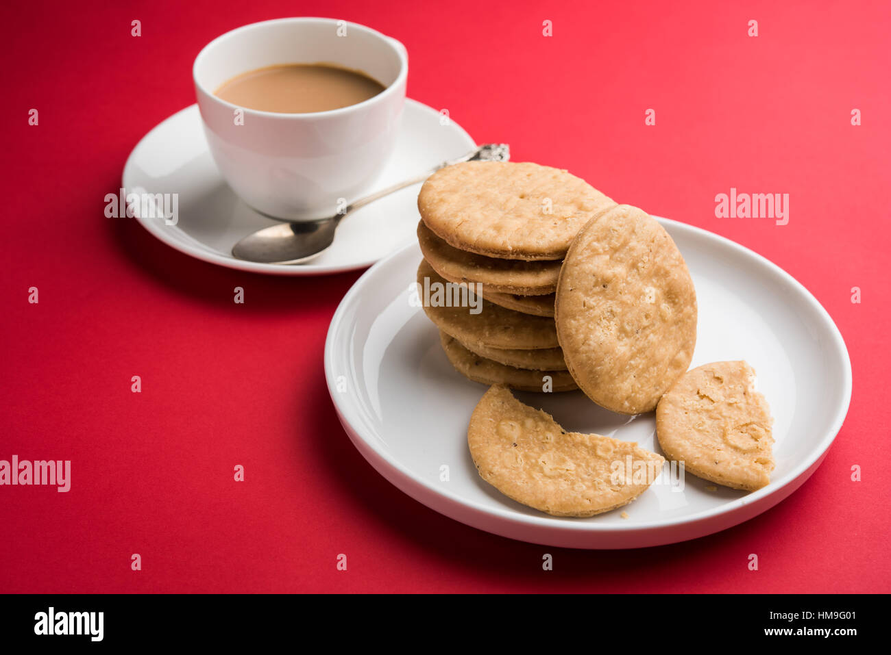 spicy fried mathri or mathari which is an indian snack served with a ...