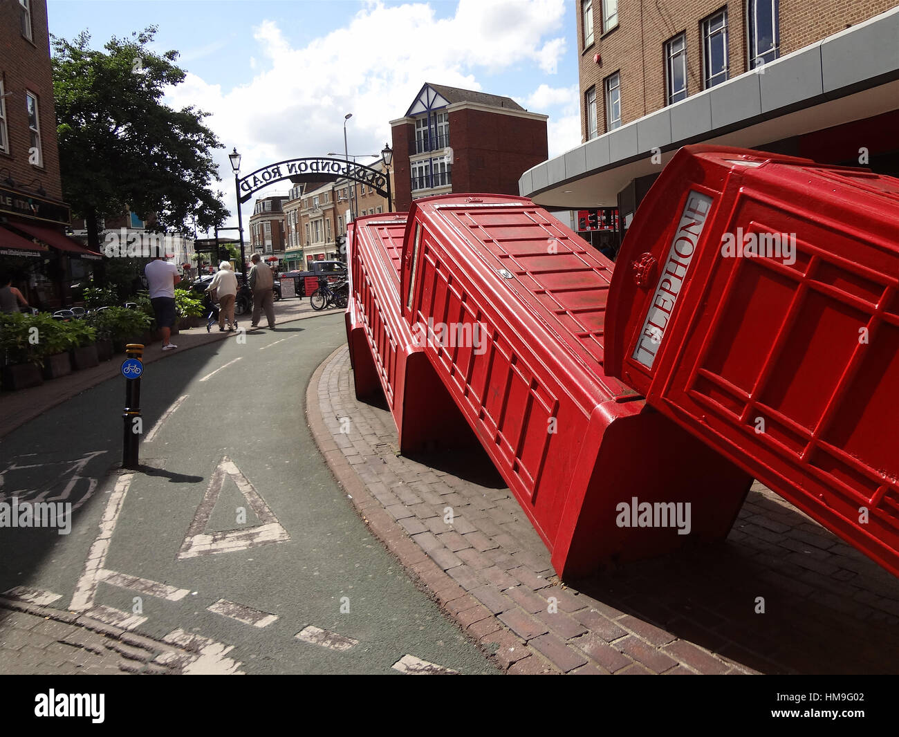 "Out of Order" by David Mach, tumbling red telephone boxes in Kingston ...