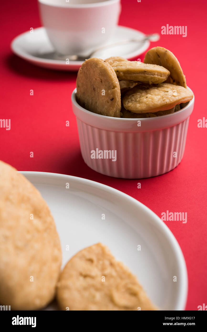 spicy fried mathri or mathari which is an indian snack served with a ...