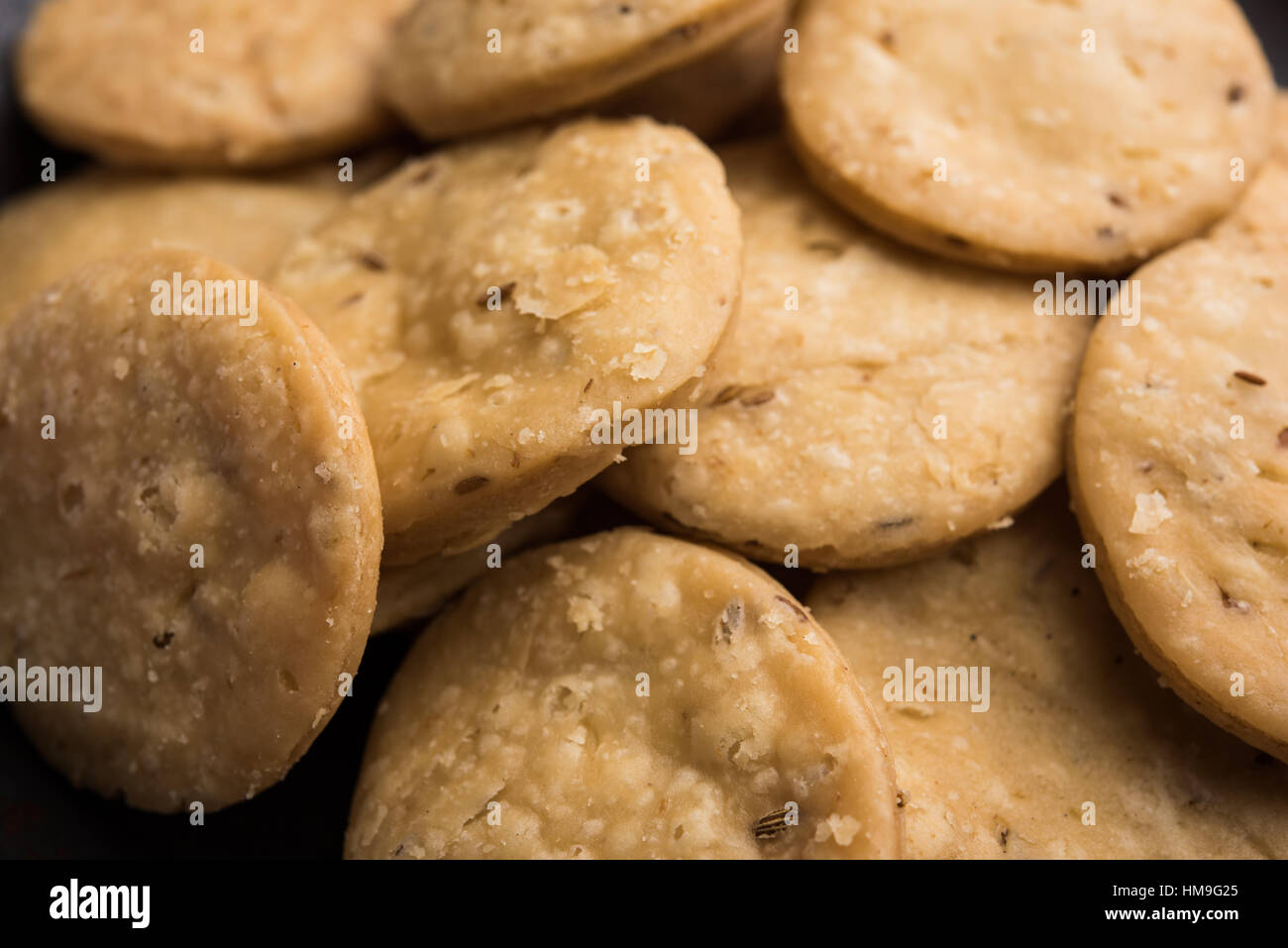 spicy fried mathri or mathari which is an indian snack served with a ...