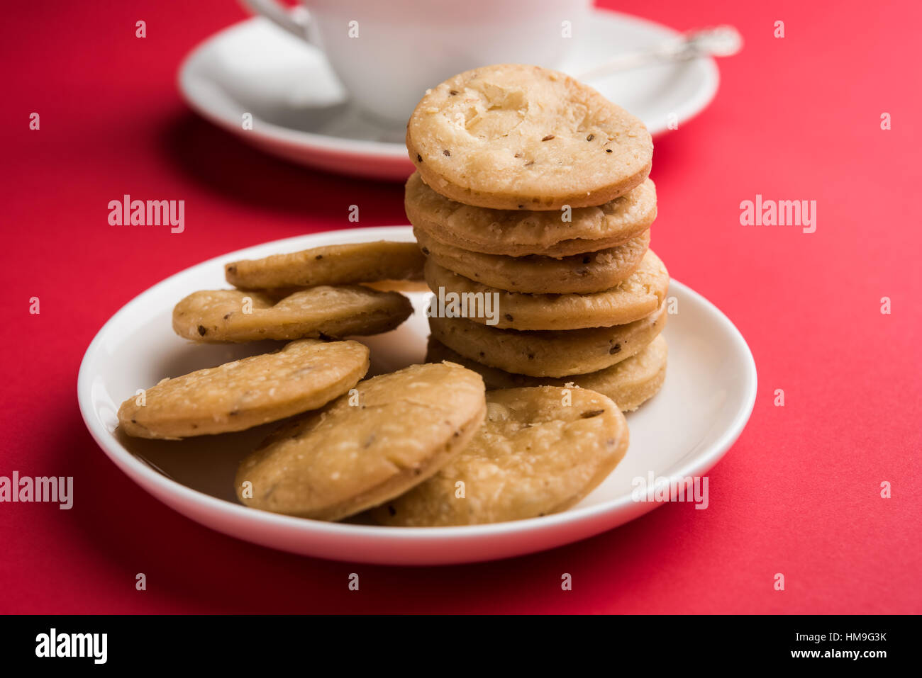 spicy fried mathri or mathari which is an indian snack served with a ...
