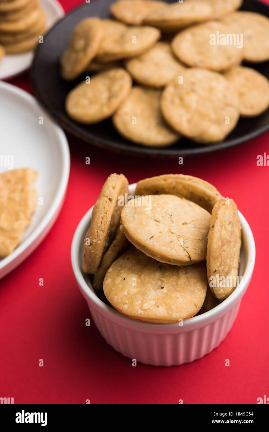 spicy fried mathri or mathari which is an indian snack served with a ...