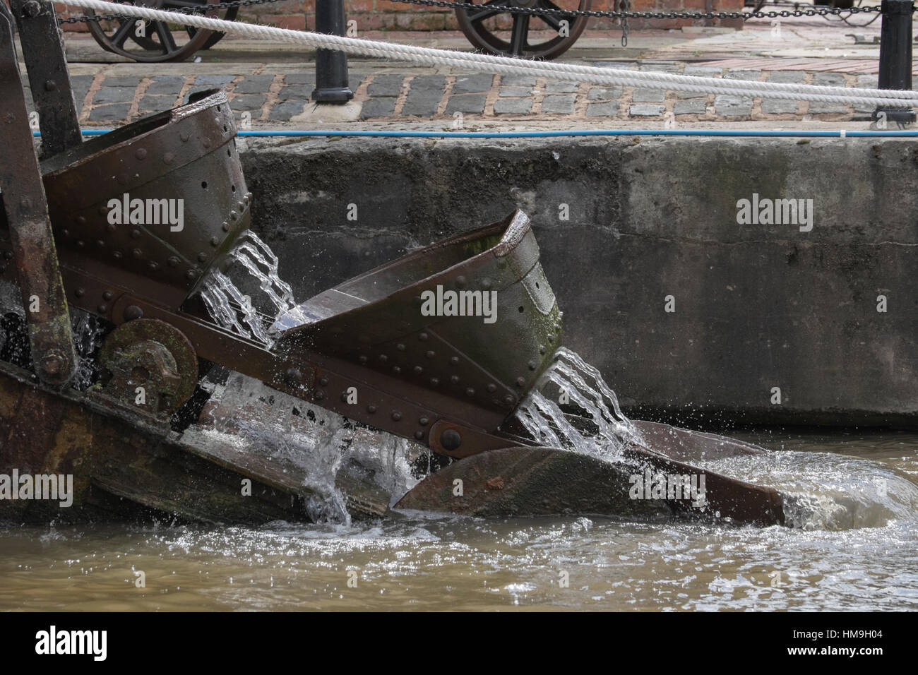 Volunteers working on a historic steam dredger in Gloucester docks ...