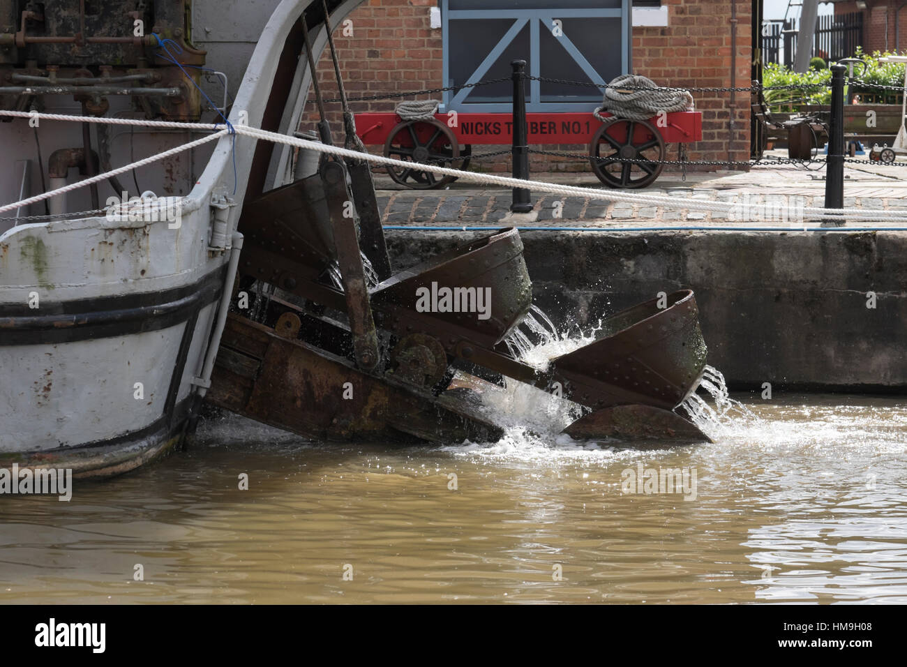 Volunteers working on a historic steam dredger in Gloucester docks ...