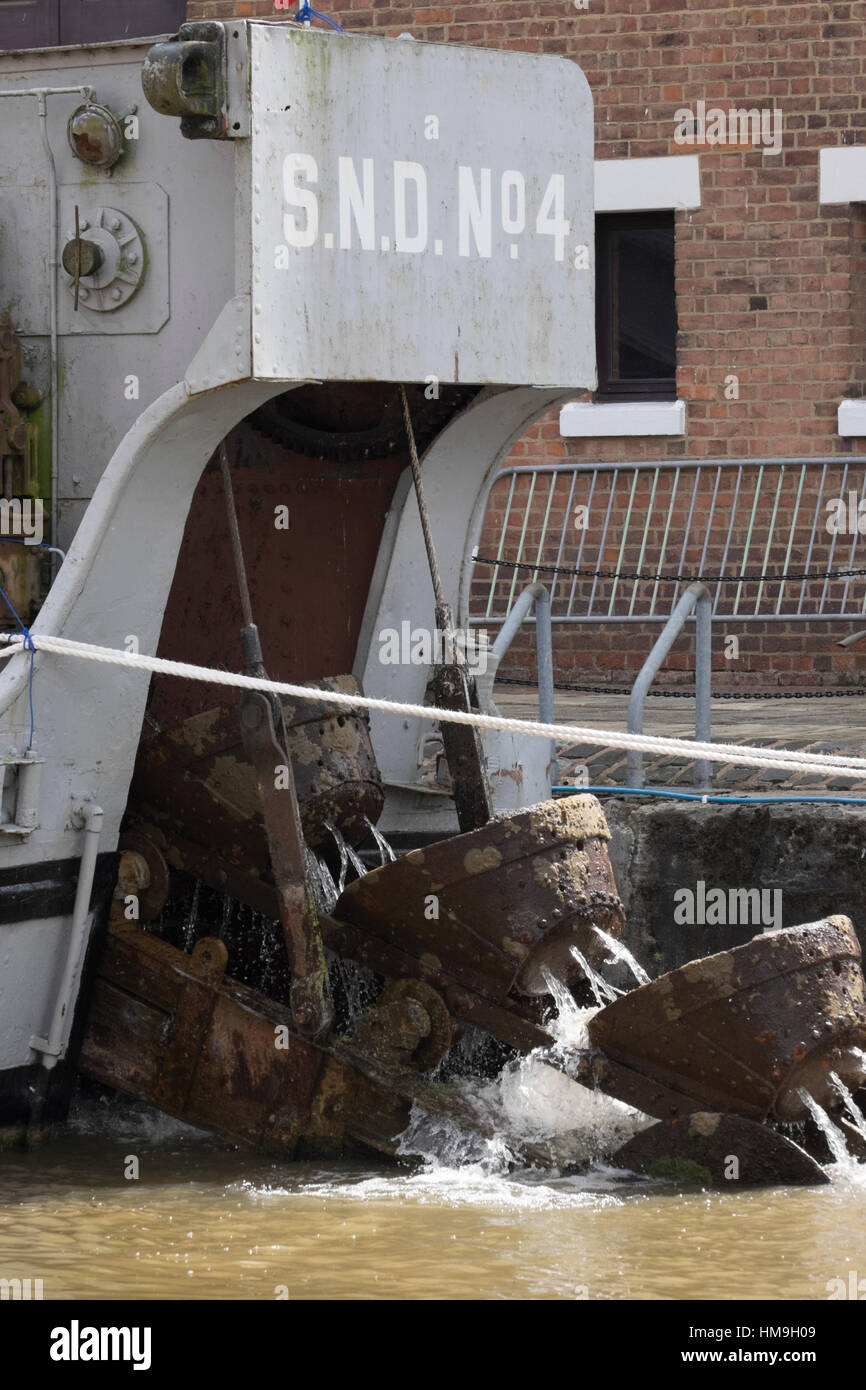 Volunteers working on a historic steam dredger in Gloucester docks ...