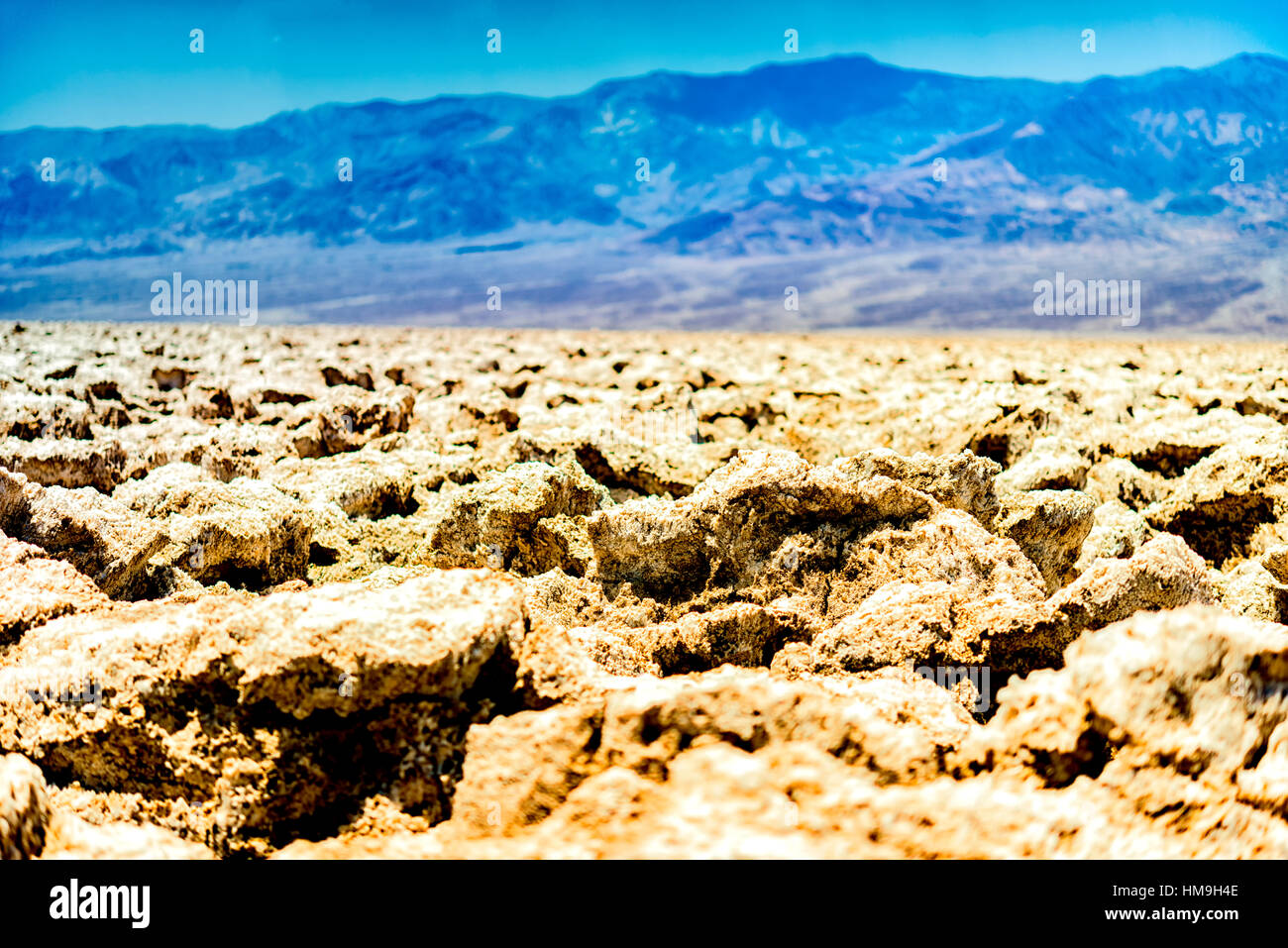 Cracked salt brine ground texture, bad water section of Death Valley ...