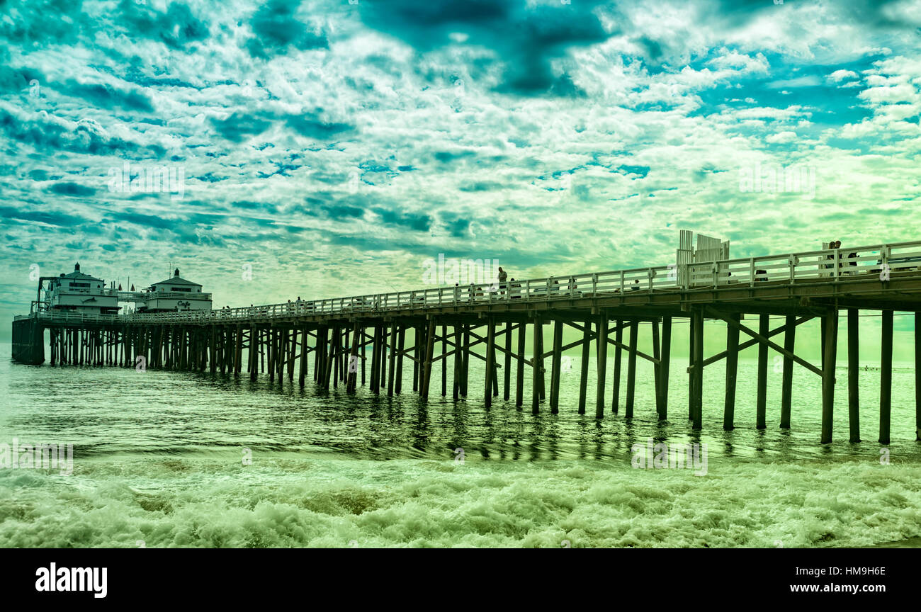 Malibu Pier in beautiful day - Big wave rushing under bridge 1 Stock ...