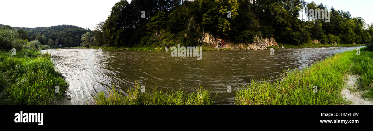 Panorama of muddy river Poprad and surrounding forest Stock Photo - Alamy