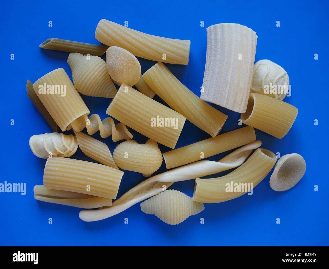 Many different types of Italian pasta including penne macaroni ...