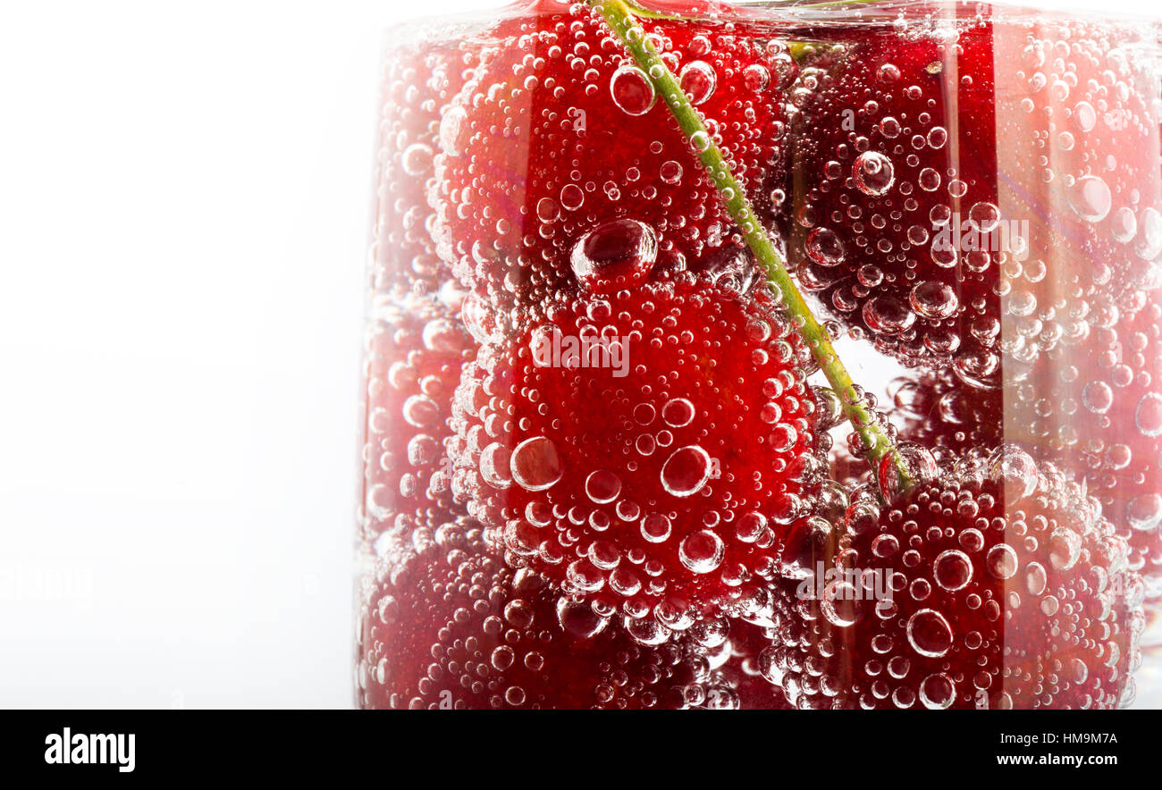 Cherry splash in transparent water hi-res stock photography and images ...