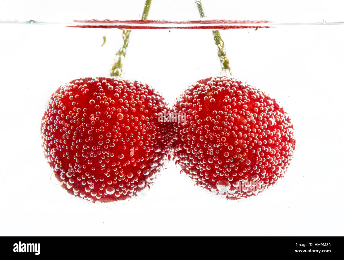 cherries in water Stock Photo - Alamy
