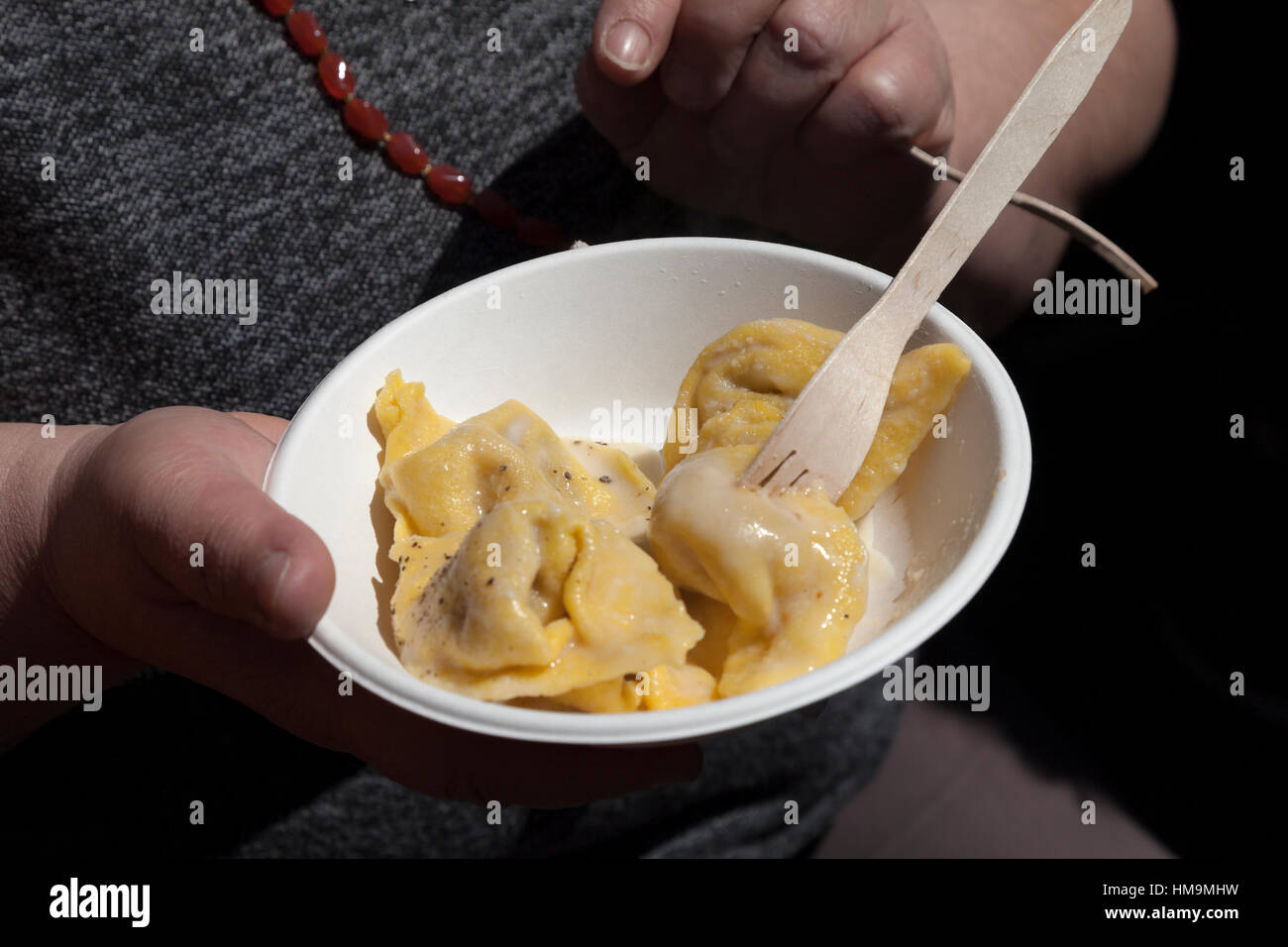 People eat cheese snack sauce hi-res stock photography and images - Alamy