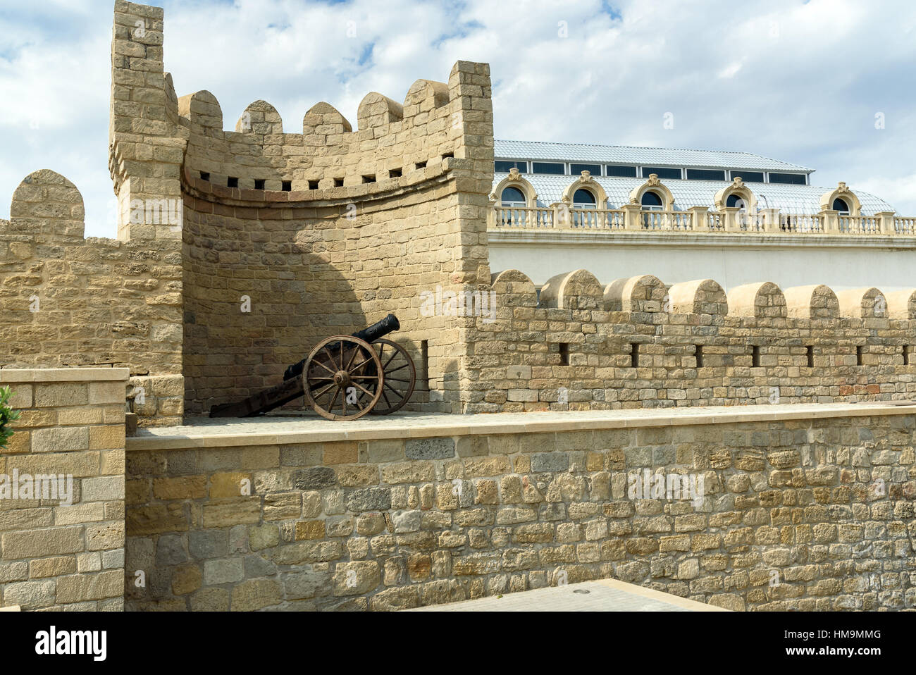 Baku, Azerbaijan - September 10, 2016: Ancient medieval cannon at tower ...
