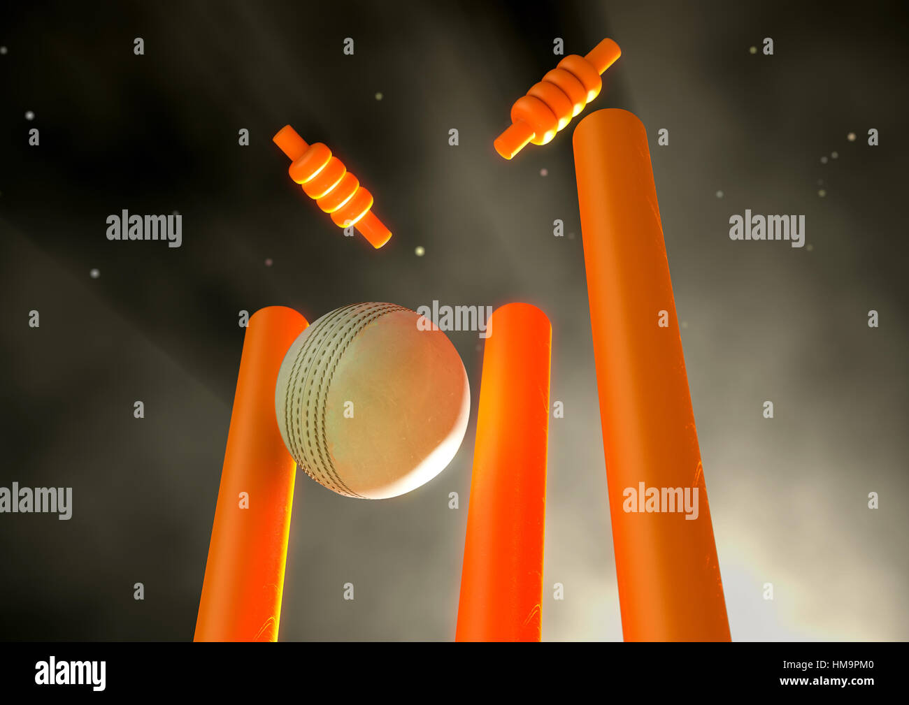 A white leather cricket ball hitting luminous orange cricket wickets on ...