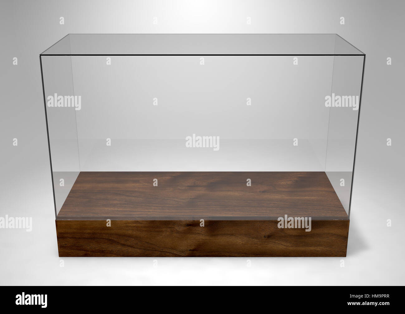 An empty rectangular glass display case with a wooden base on an ...