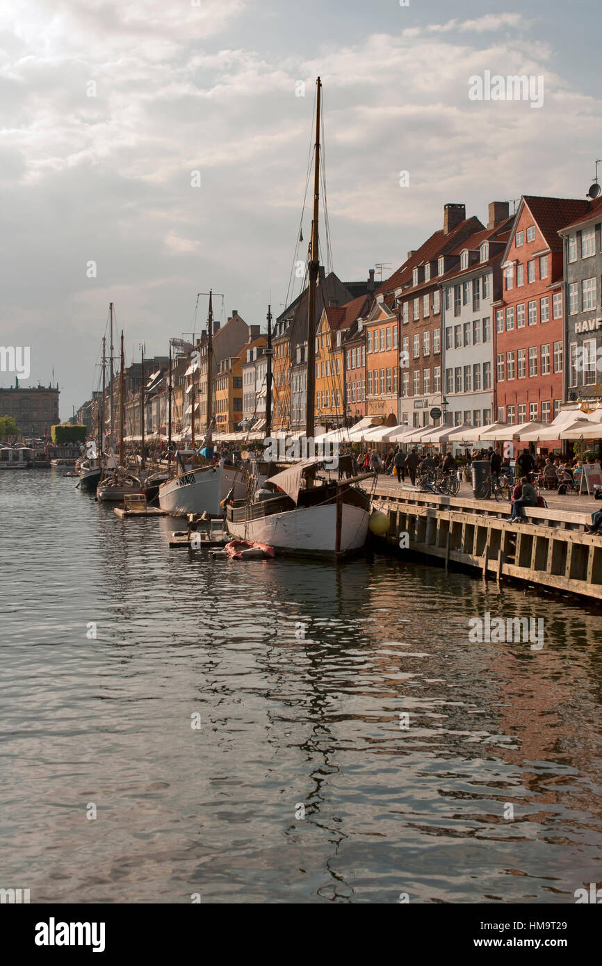 Nyhavn channel in Copenhagen, Denmark in a cloudy day Stock Photo - Alamy