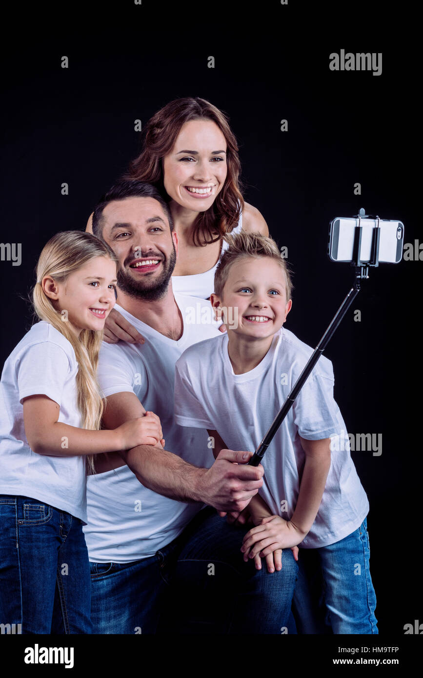 Happy family taking selfie Stock Photo - Alamy