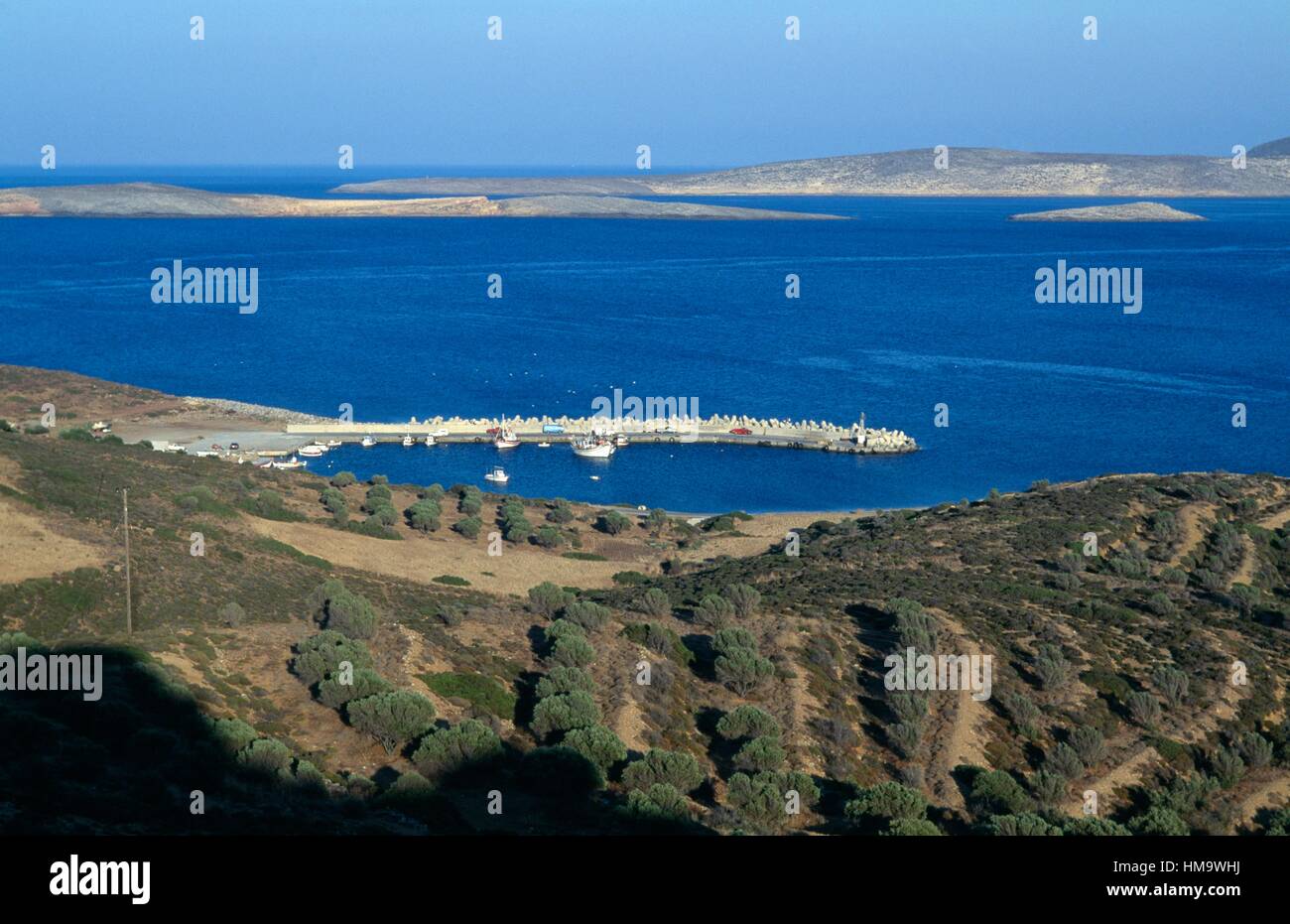 The dock near Kouremenos beach, Palekastro, Crete, Greece Stock Photo ...