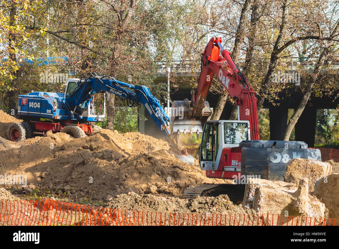 Construction site with diggers digging the ground for new heating ...