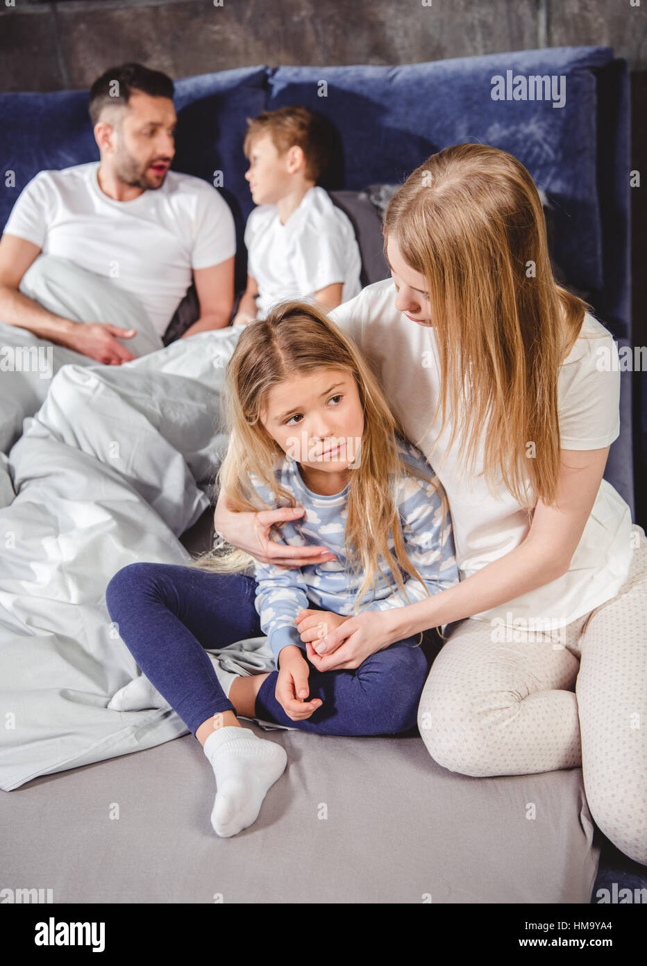 Sad son hugging mother home hi-res stock photography and images - Alamy