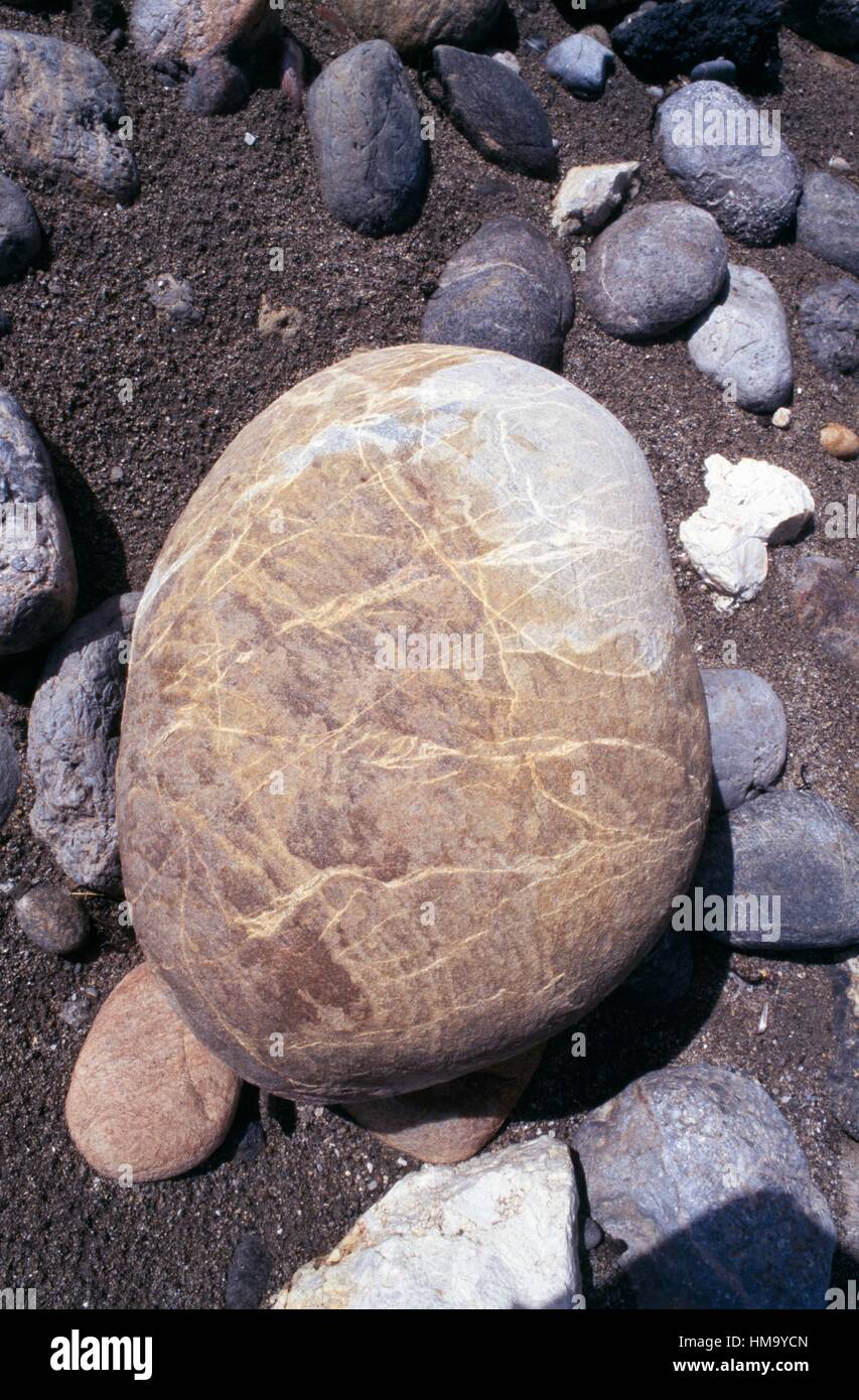 Mottled rock on Paleochora beach, Crete, Greece Stock Photo - Alamy