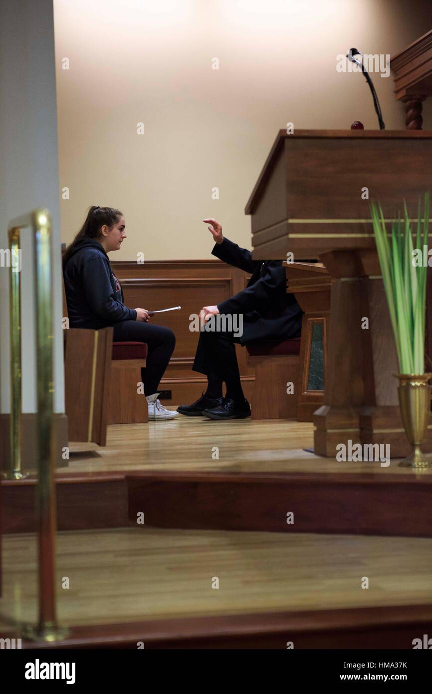 Girl prays in church hi-res stock photography and images - Alamy