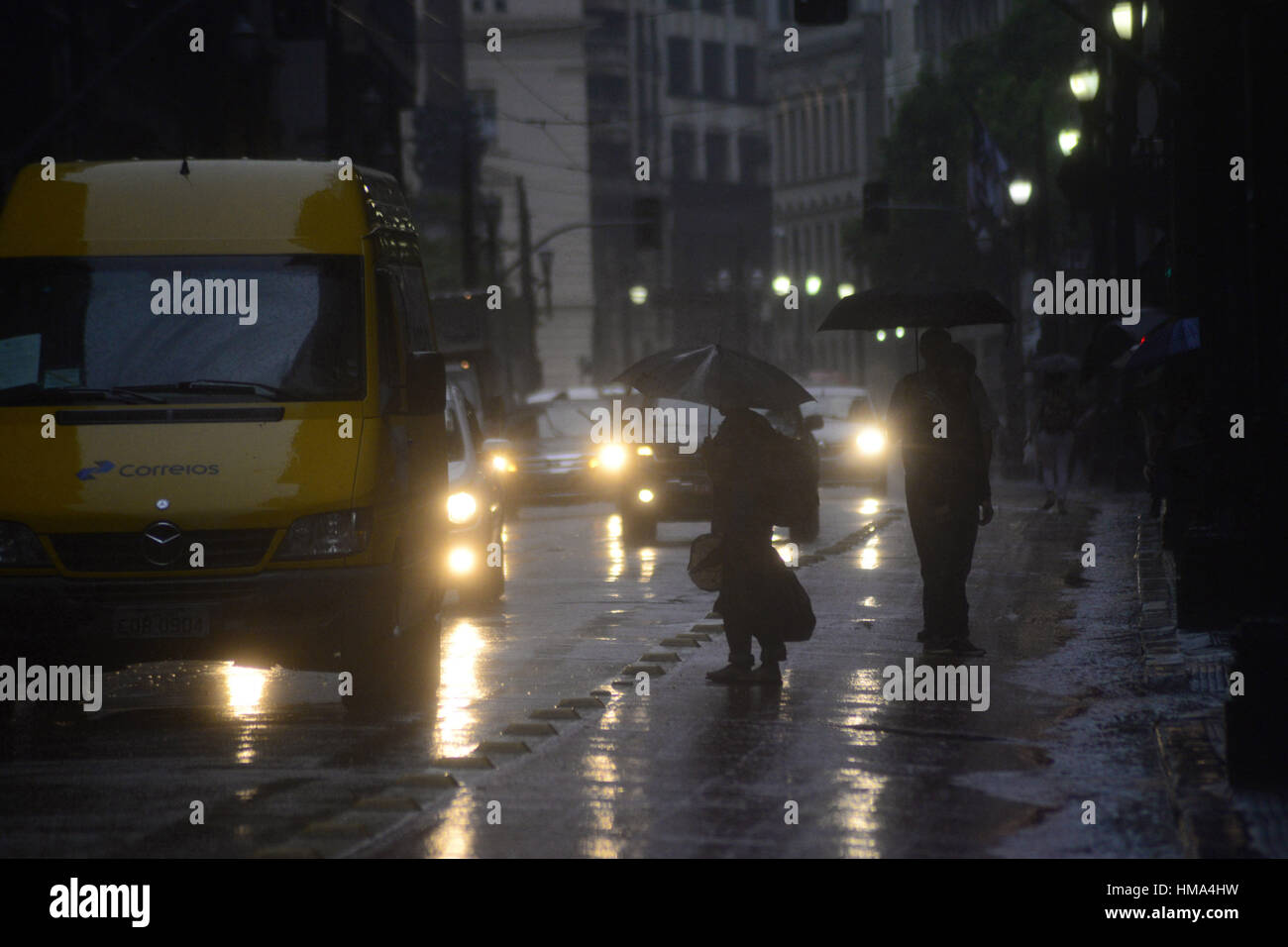 Sao Paulo, Brazil. 1st Feb, 2017. Pedestrians walk in heavy rain in ...