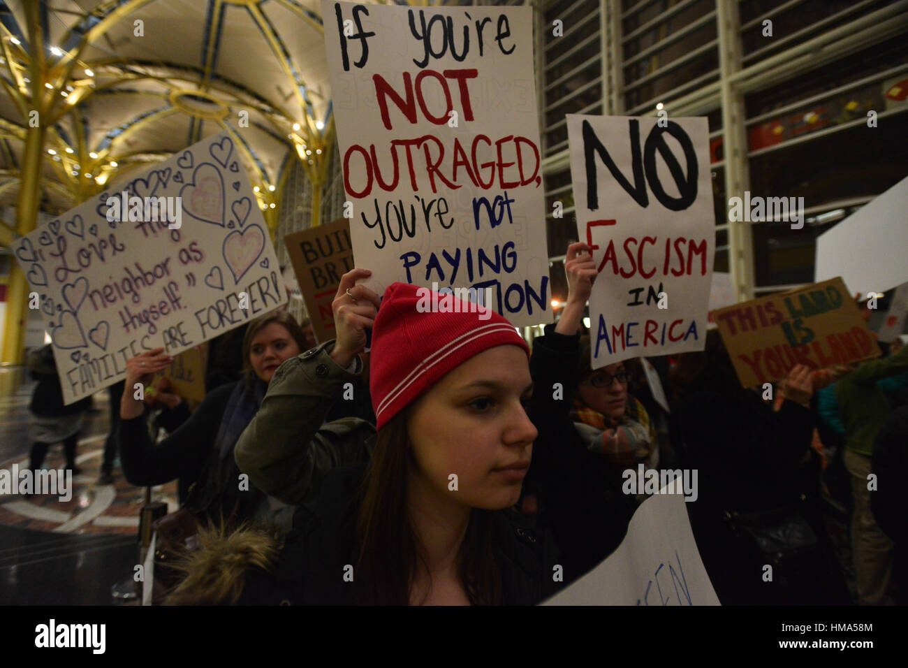 Washington, USA. 1st Feb, 2017. Protesters gather at Reagan National ...
