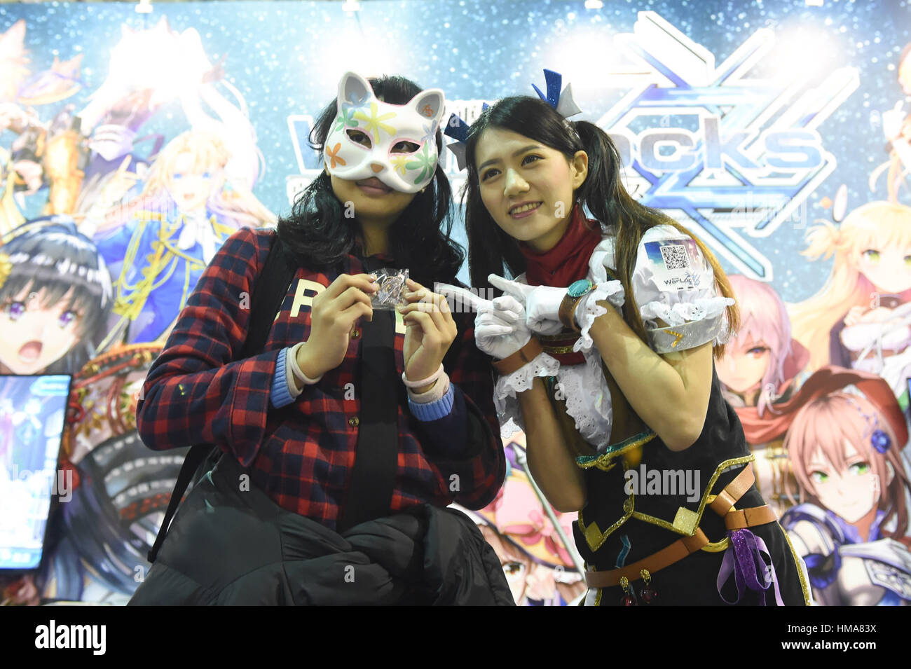 Taipei's Taiwan. 2nd Feb, 2016. Animation lovers pose for photos during ...